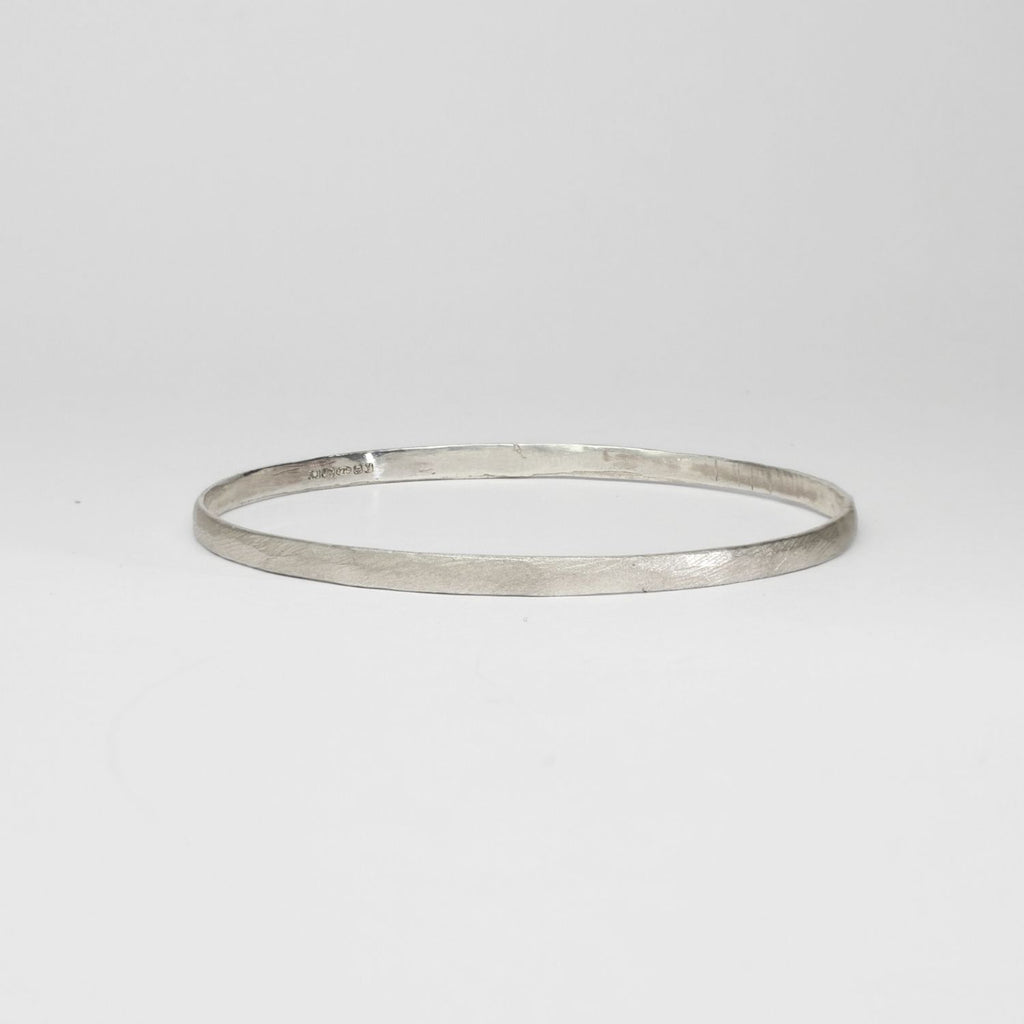 Silver textured bangle by Bea Jareno – Mari Thomas Jewellery